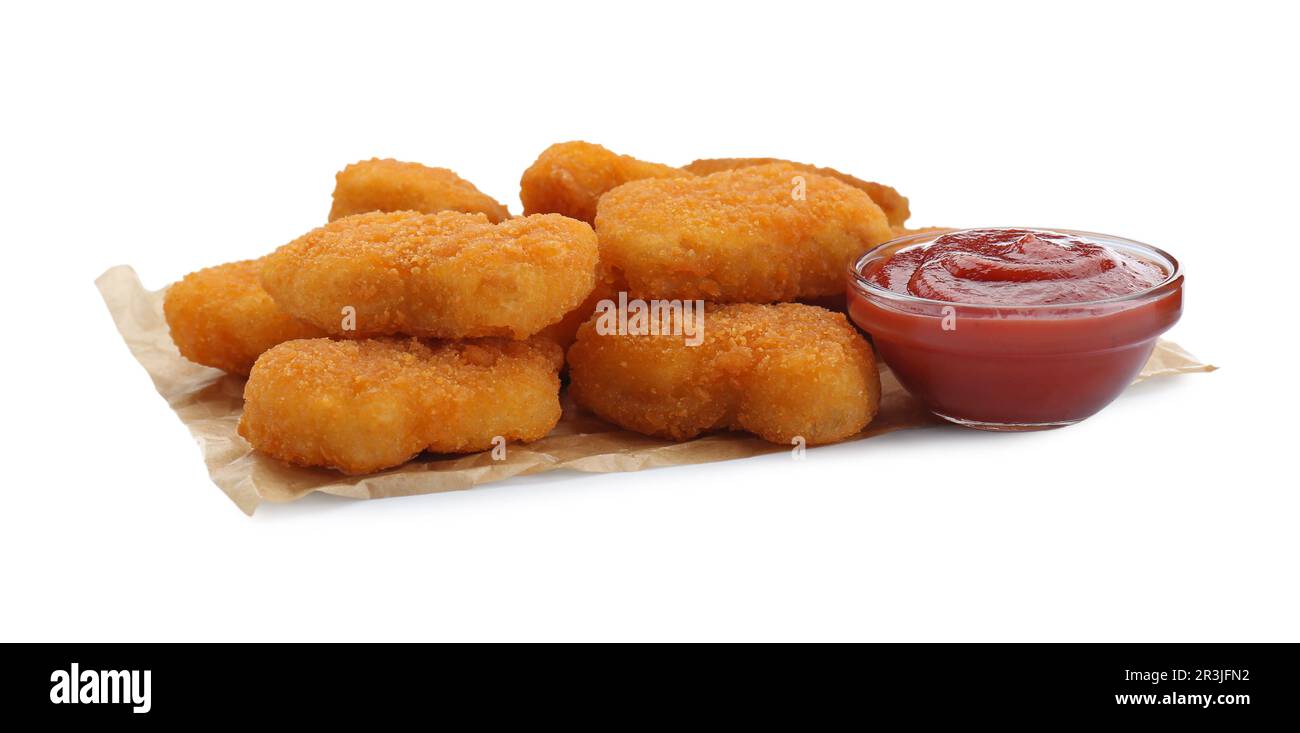 Tasty chicken nuggets with ketchup isolated on white Stock Photo - Alamy