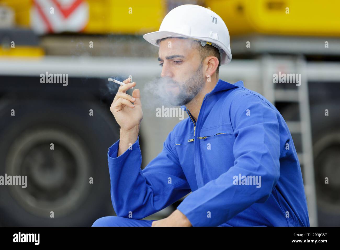 construction worker smoking Stock Photo - Alamy