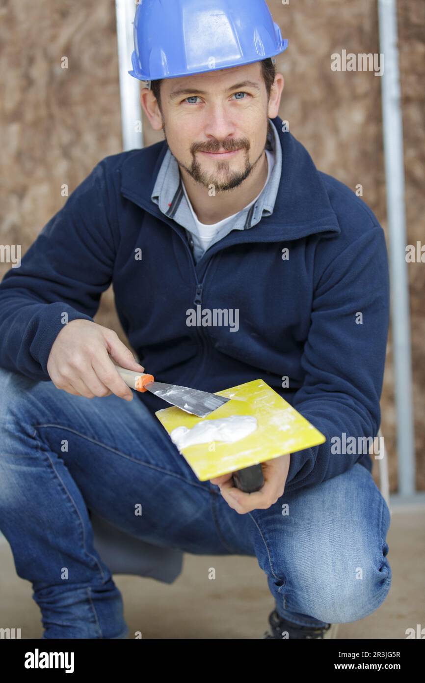 man plastering a brick wall Stock Photo - Alamy