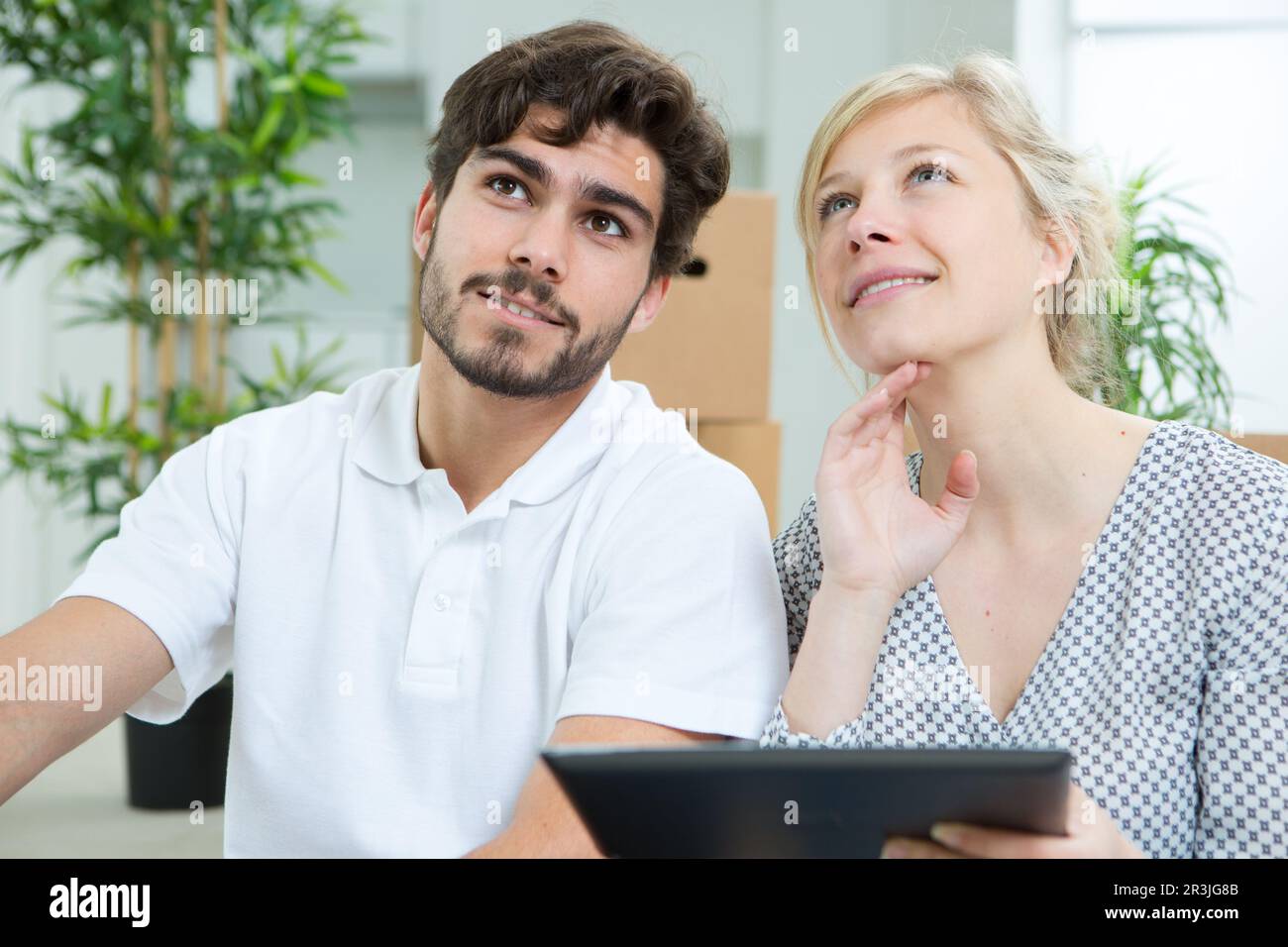 couple daydreaming on their new home Stock Photo - Alamy