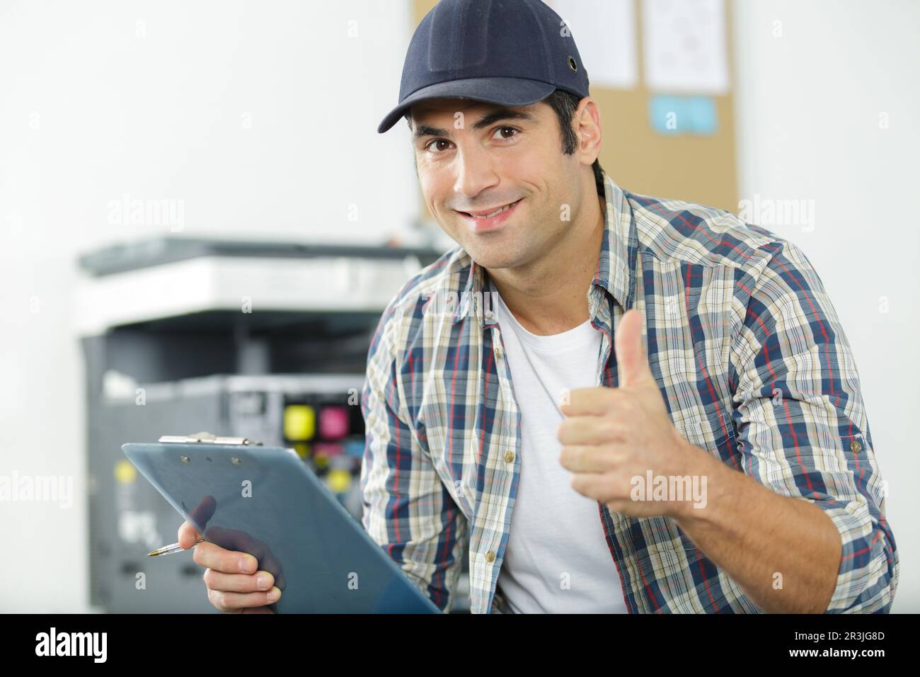 hardware repairman repairing broken printer fax machine Stock Photo - Alamy