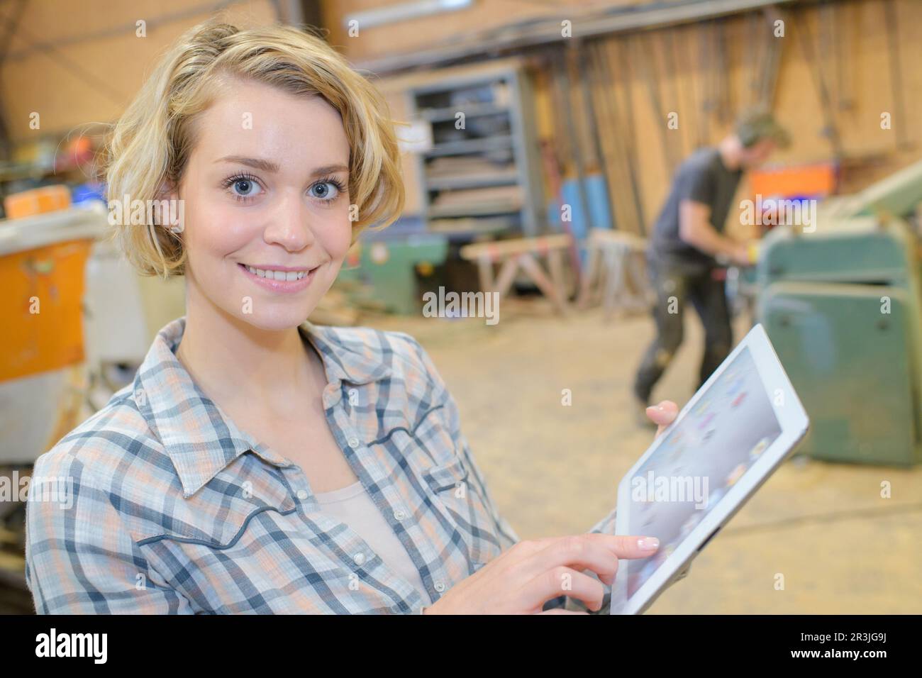 beautiful female worker using digital tablet Stock Photo - Alamy