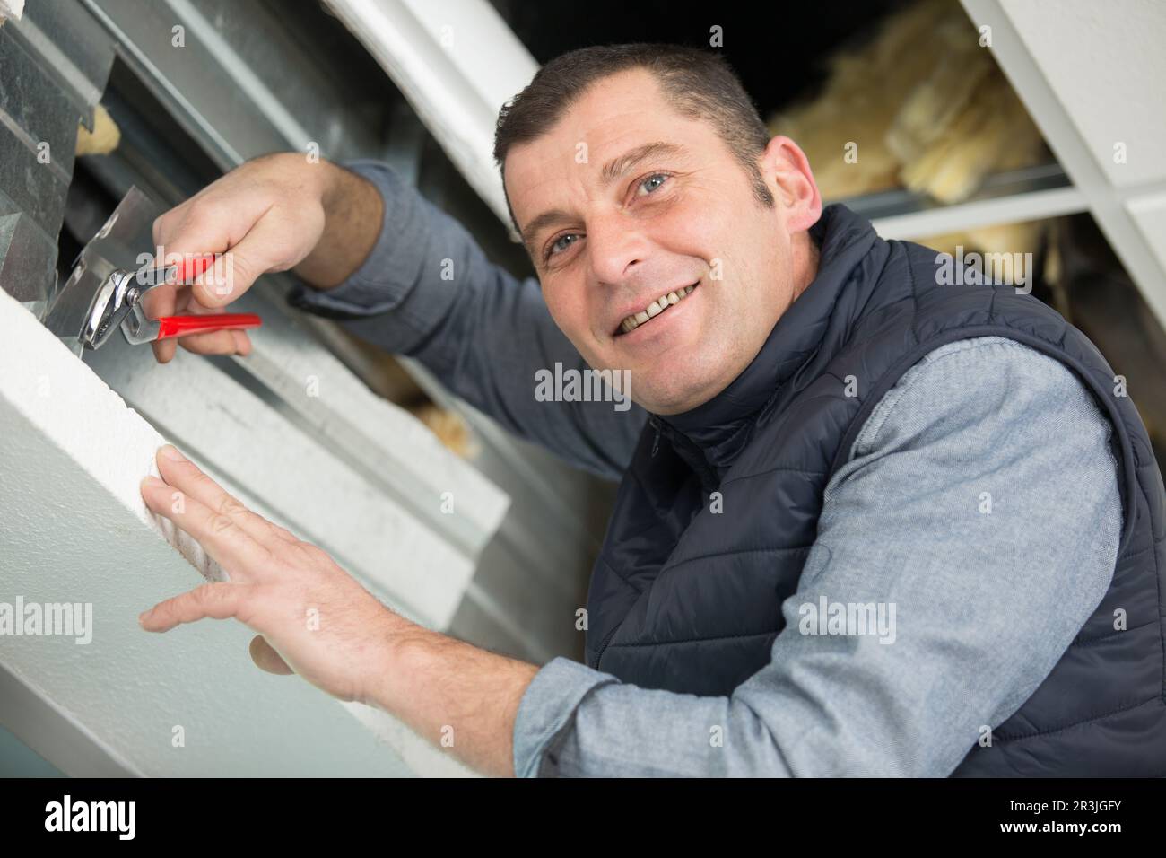 Plier holding hi-res stock photography and images - Alamy