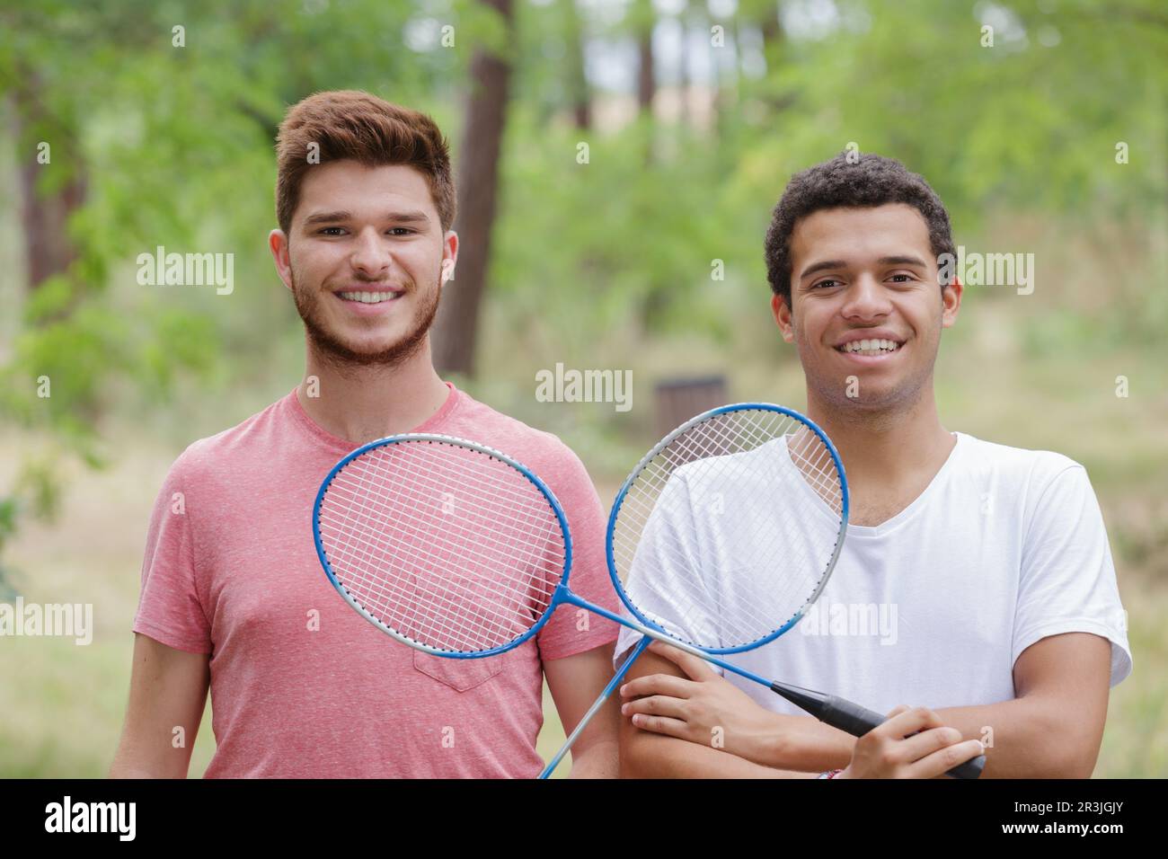 portrait of two young male badminton players Stock Photo - Alamy