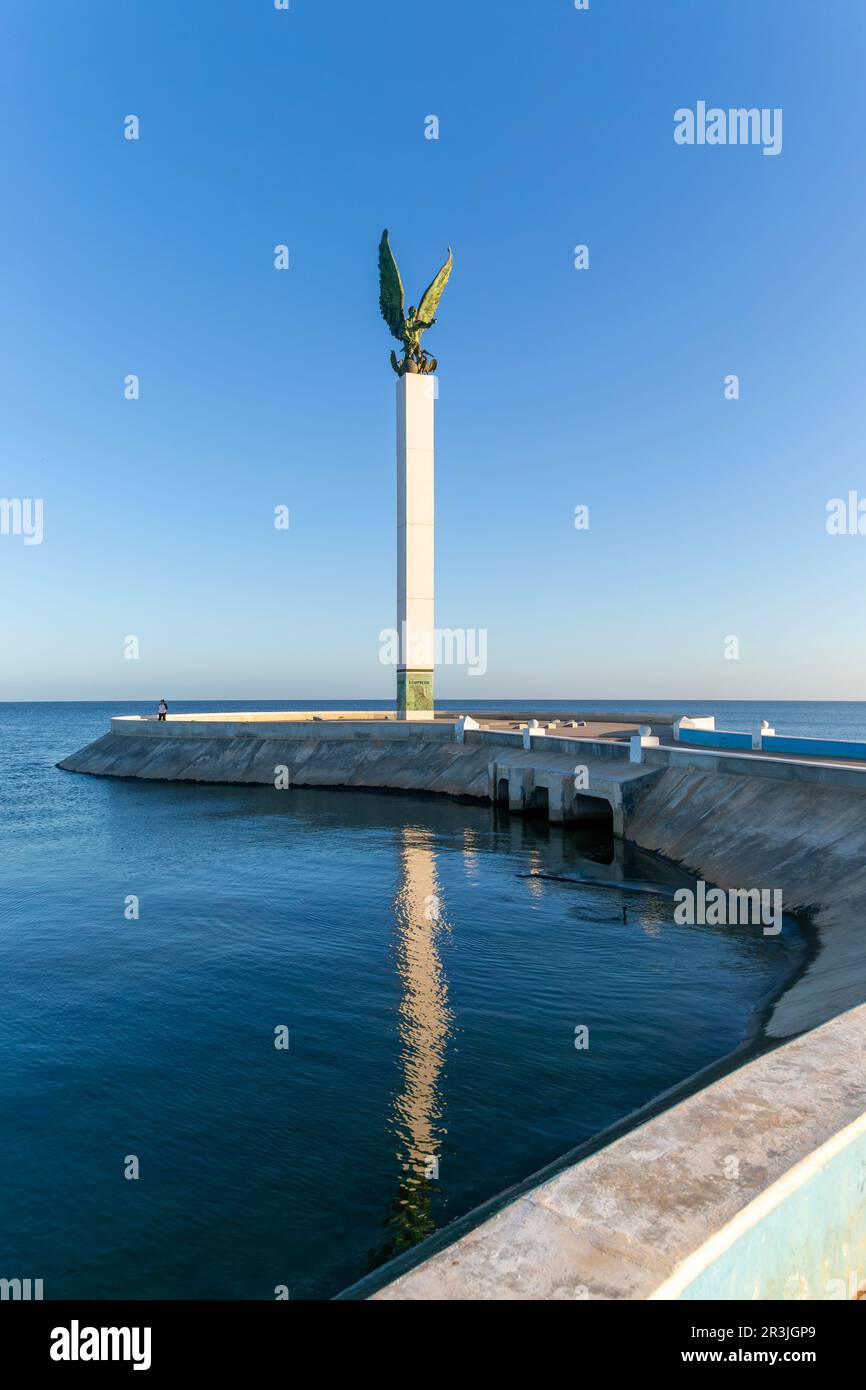 Sculpture of winged Mayan Angel on tall column, the seafront Malecon ...
