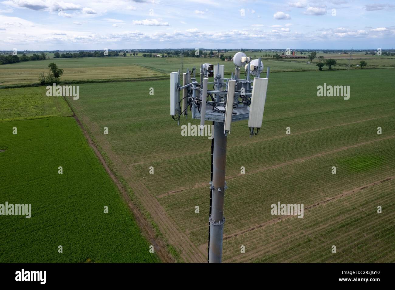5G Cell Towers on countryside rural background in Italy Stock Photo - Alamy