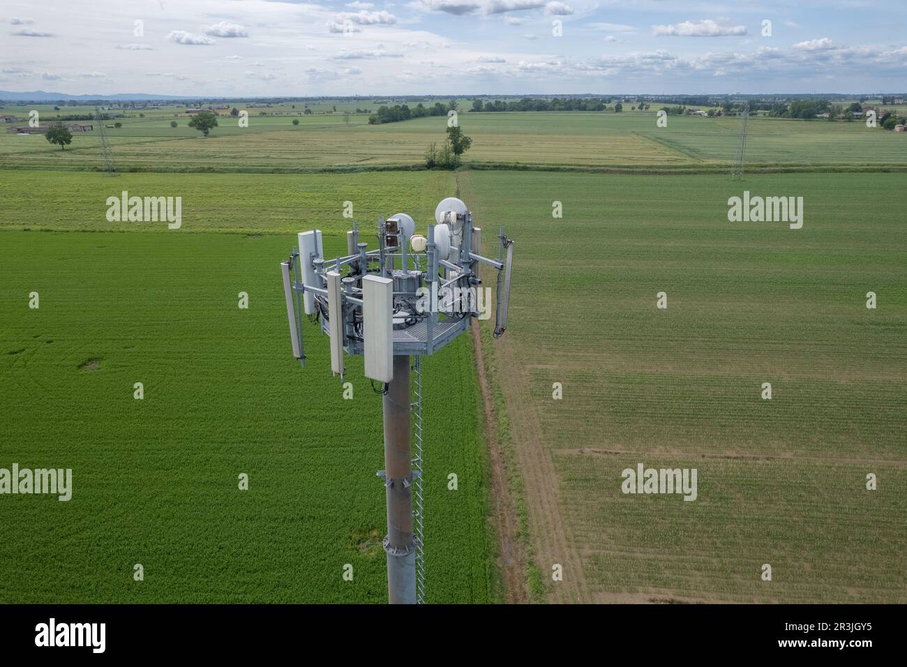 5G Cell Towers on countryside rural background in Italy Stock Photo - Alamy