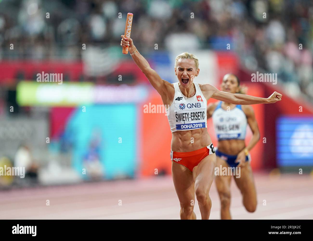 Justyna Święty-Ersetic running the 4x400m relay at the 2019 World ...