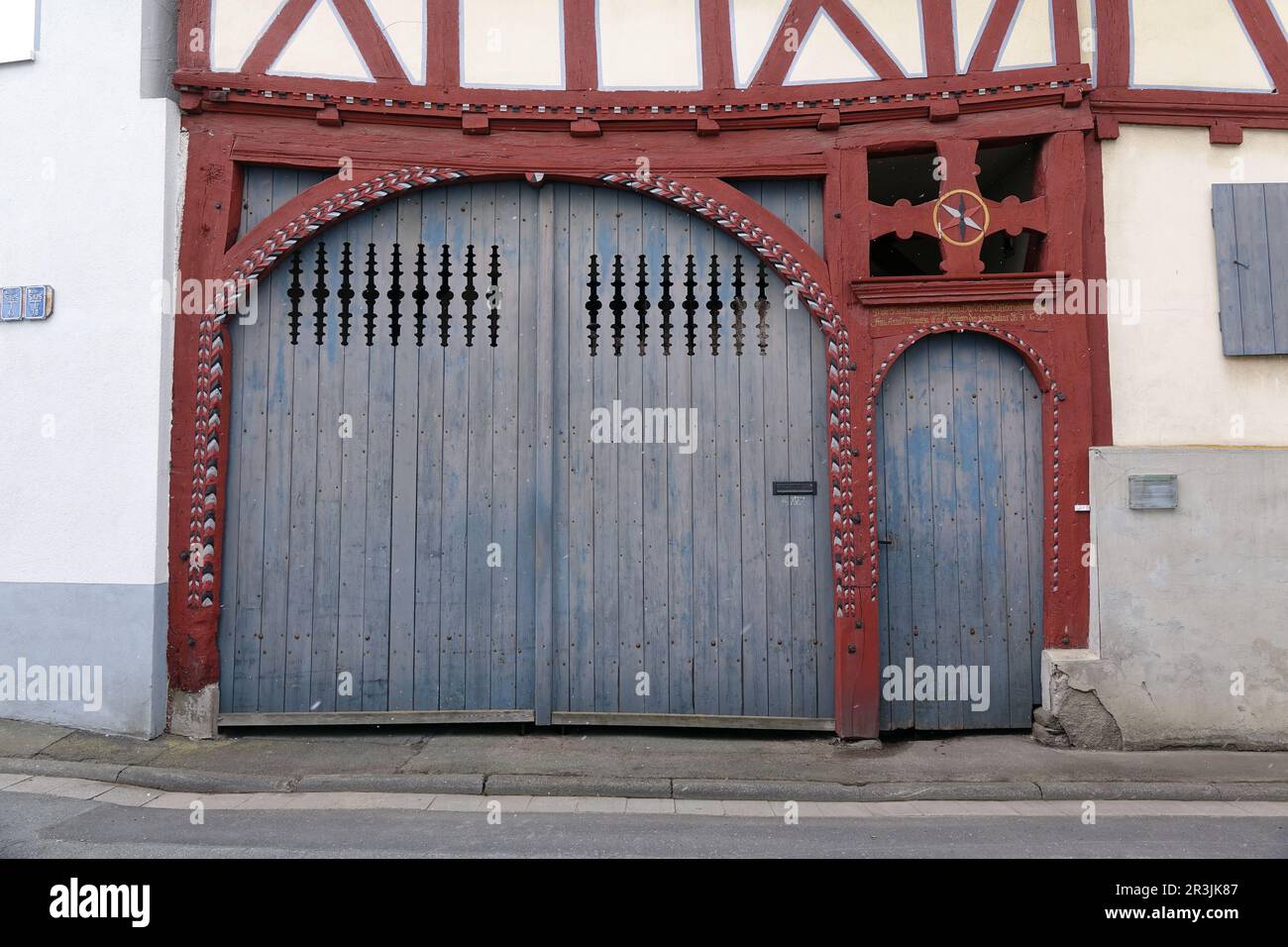 Gate and door on a house Stock Photo - Alamy