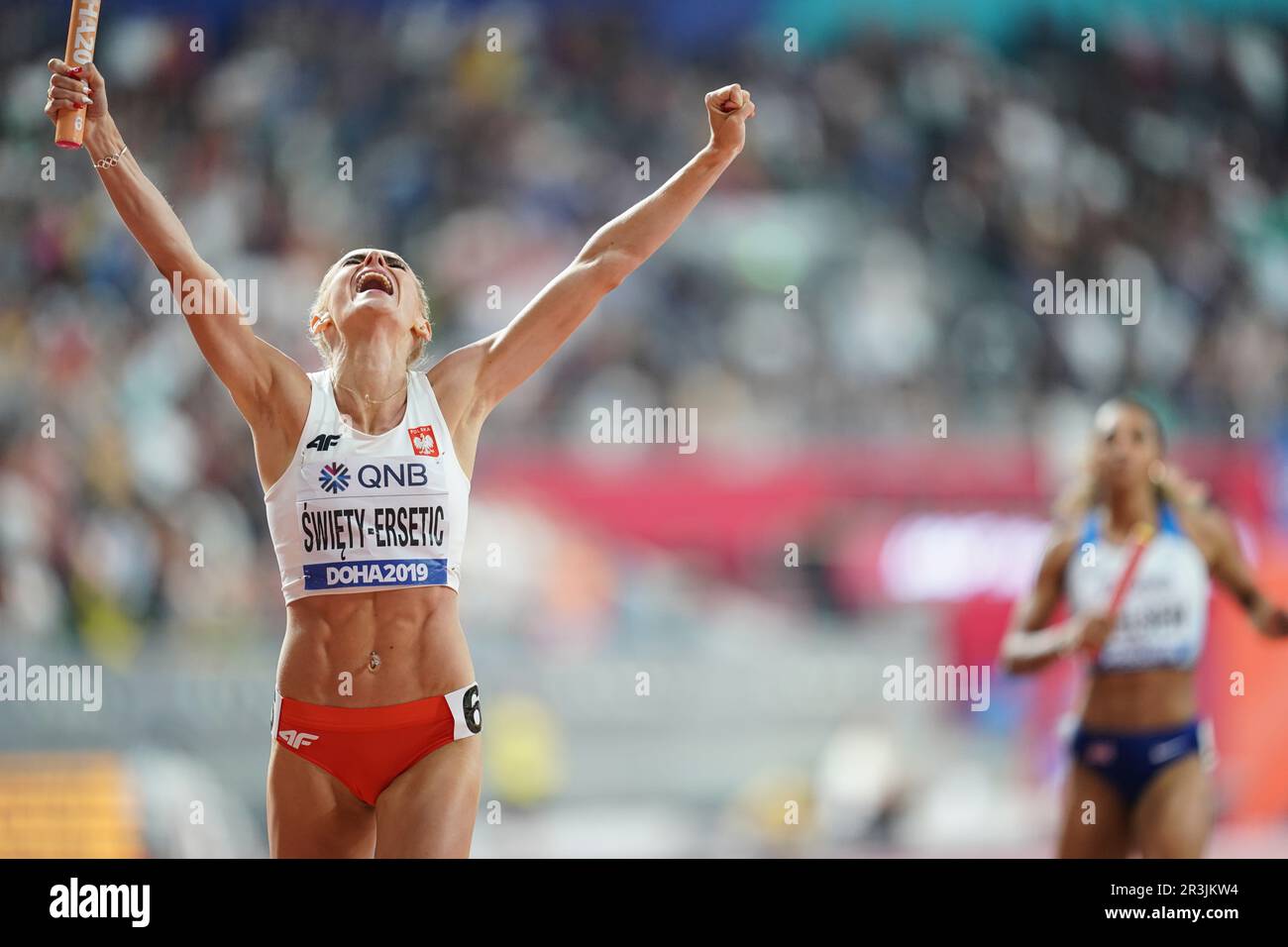 Justyna Święty-Ersetic running the 4x400m relay at the 2019 World ...