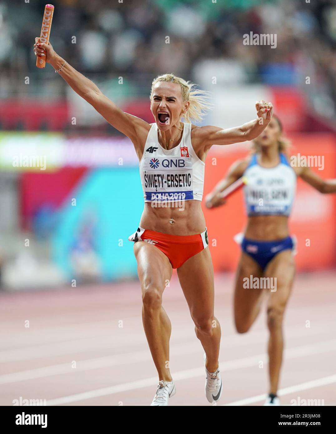 Justyna Święty-Ersetic running the 4x400m relay at the 2019 World ...