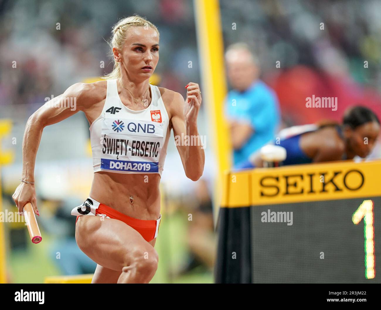 Justyna Święty-Ersetic running the 4x400m relay at the 2019 World ...