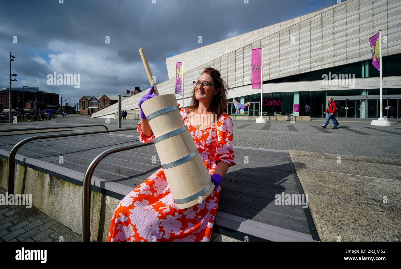 Kay Jones, Lead Curator at Museum of Liverpool, holds the milk churn ...