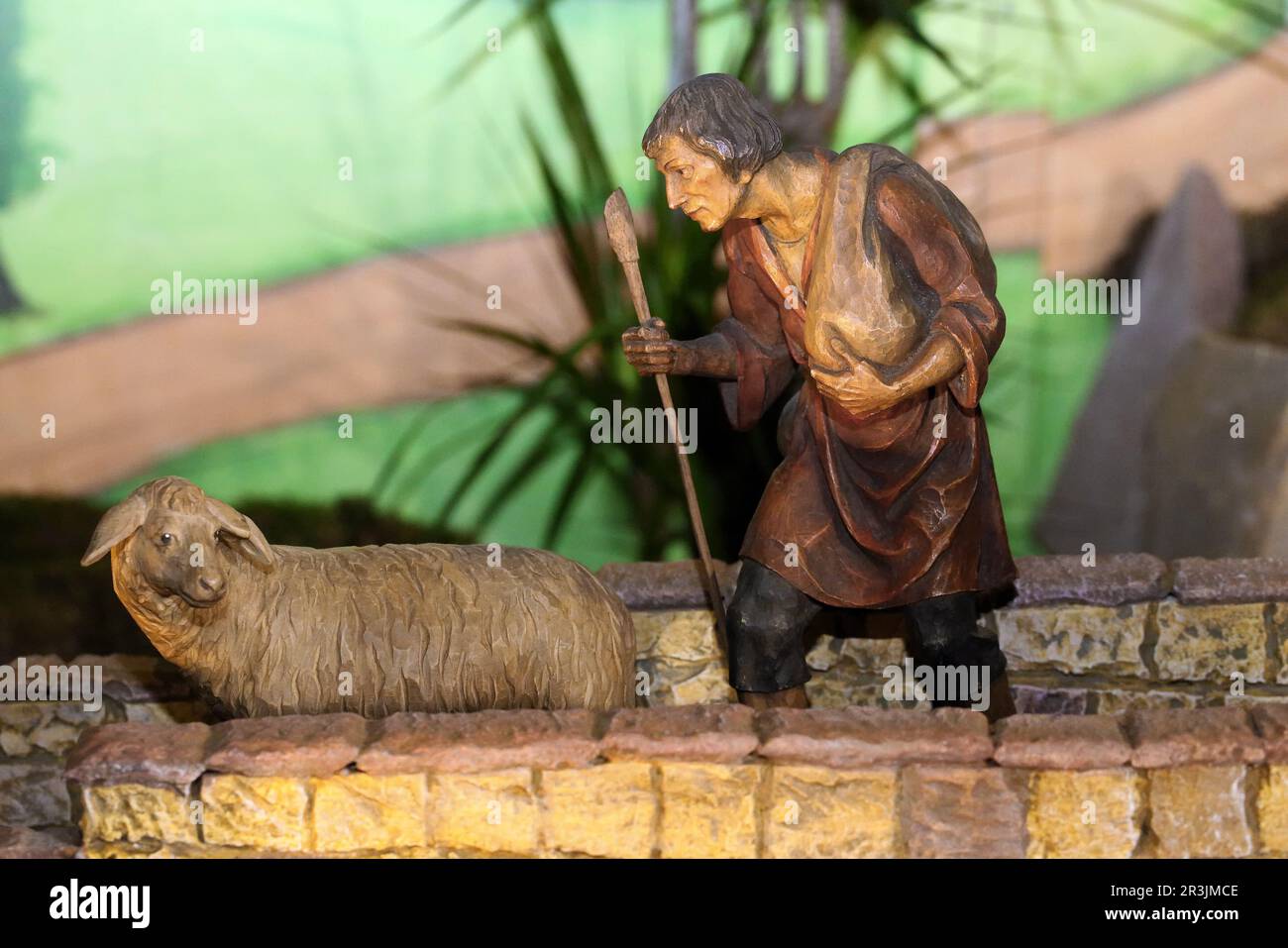 Nativity figurine, Shepherd with sheep Stock Photo - Alamy