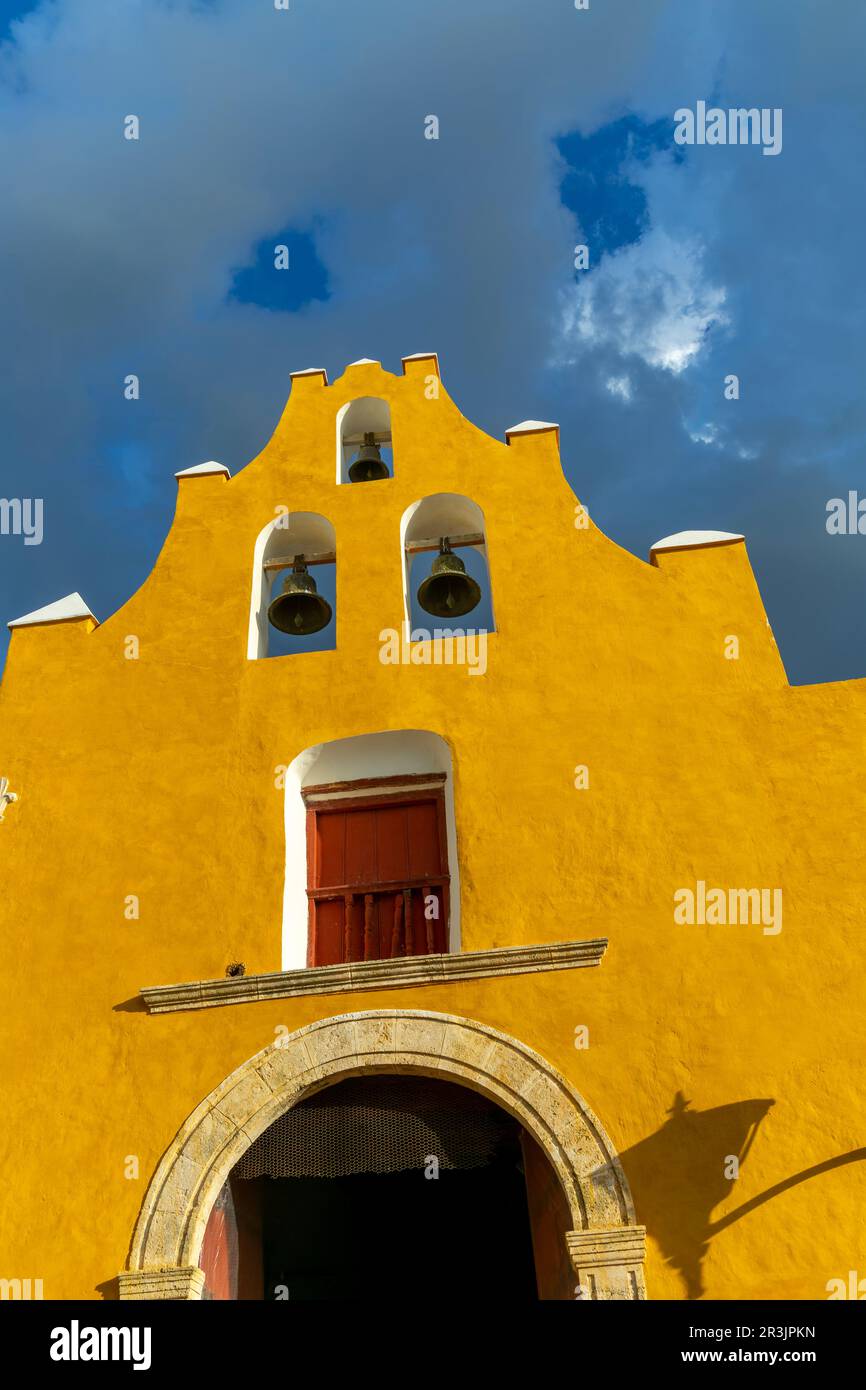 Yellow facade frontage of historic church convent of San Roque ...