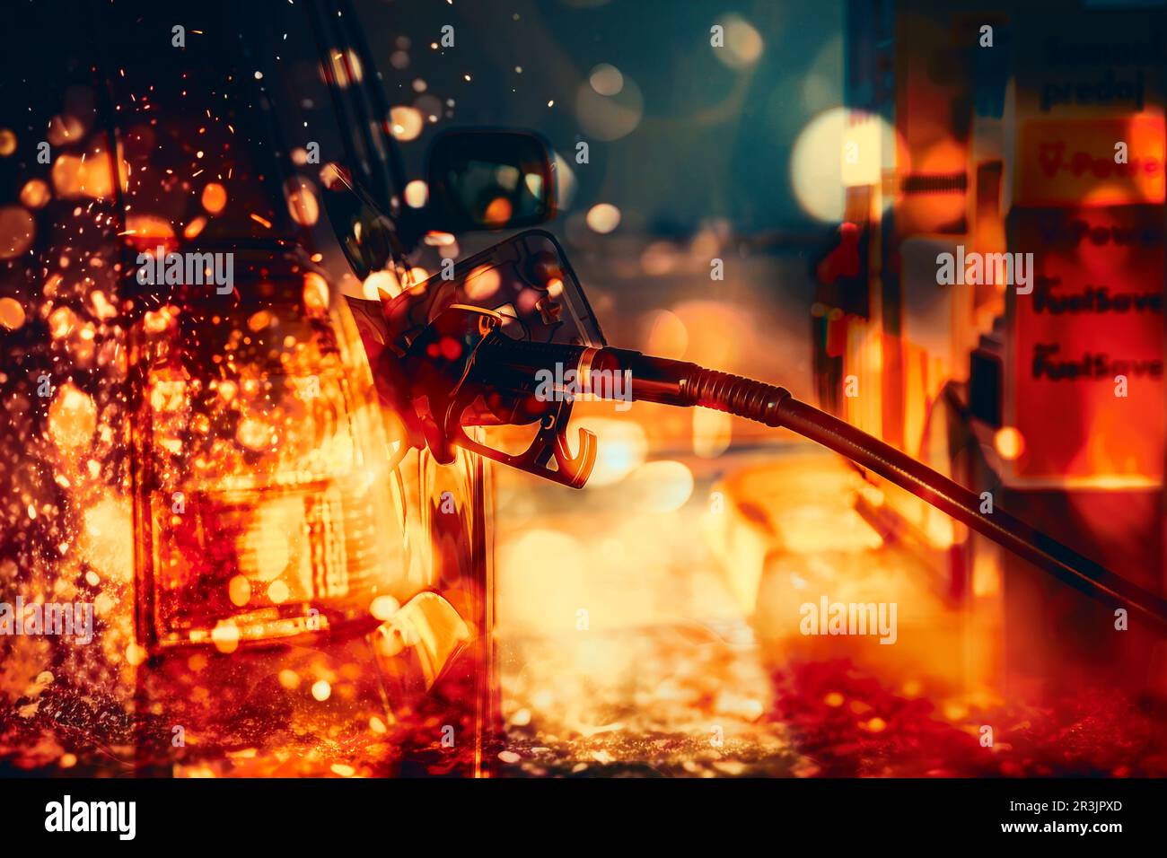 pumping gasoline fuel in a car at a gas station. Fire effect Stock ...