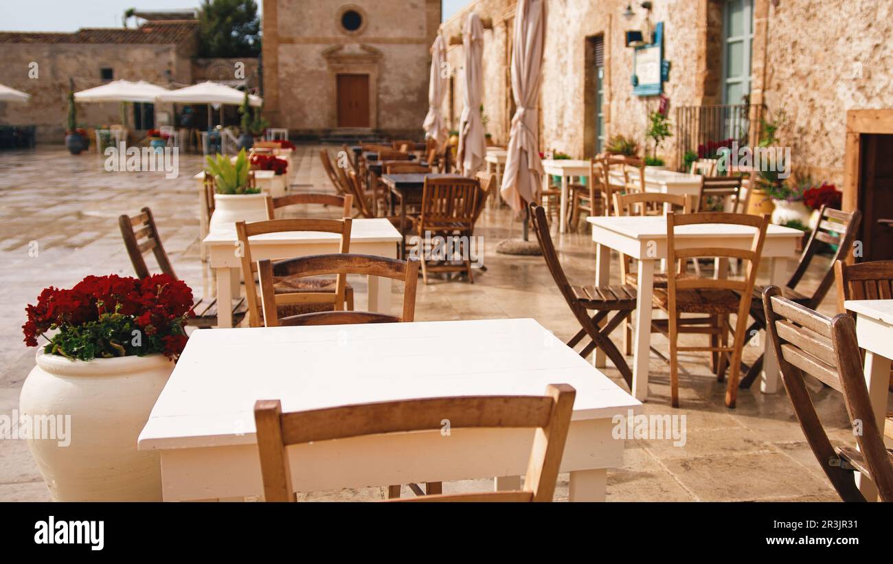 Outdoor restaurant in a typical Italian village Stock Photo - Alamy