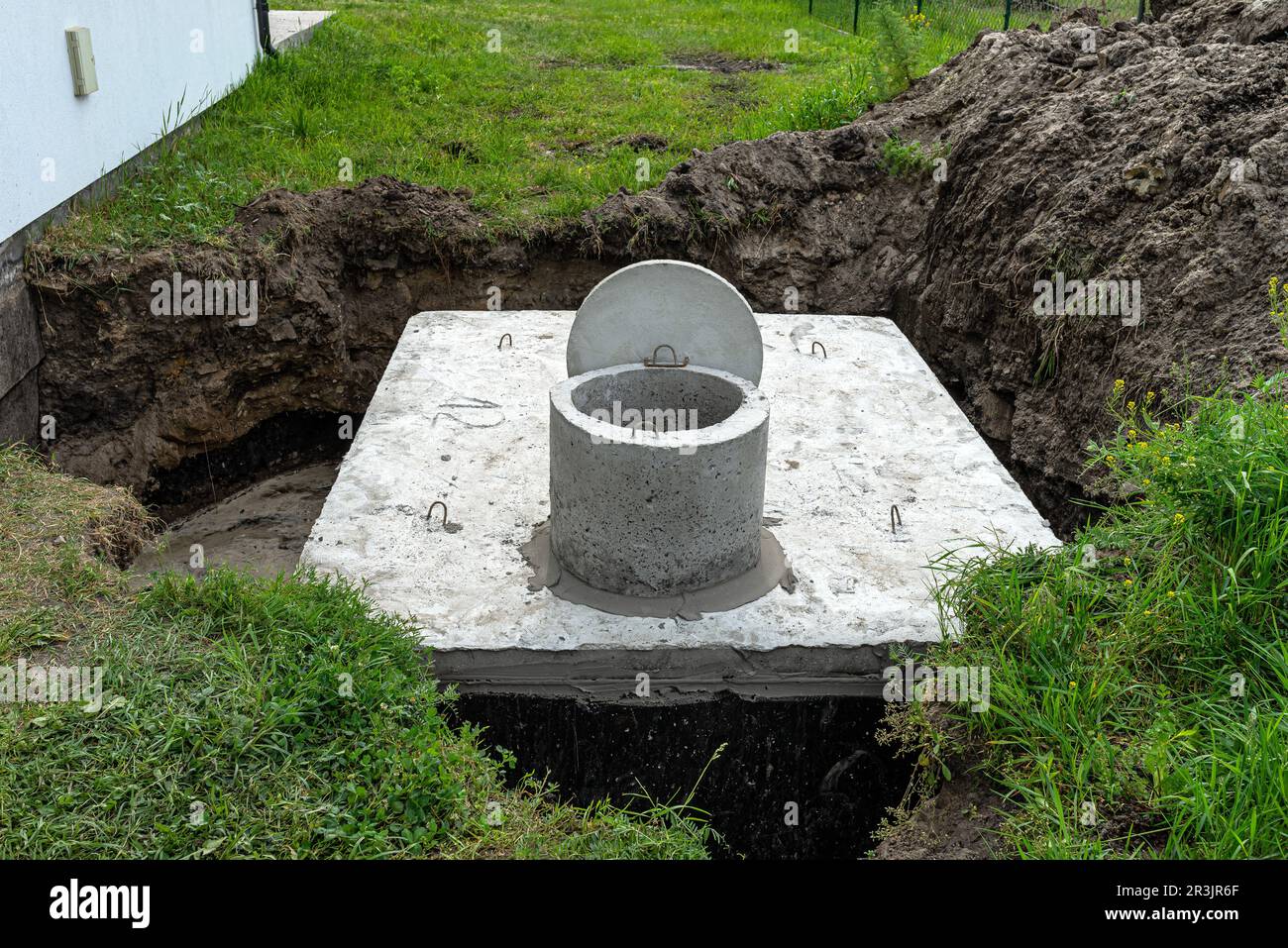 Concrete septic tank with a capacity of 10 cubic meters placed in the ...