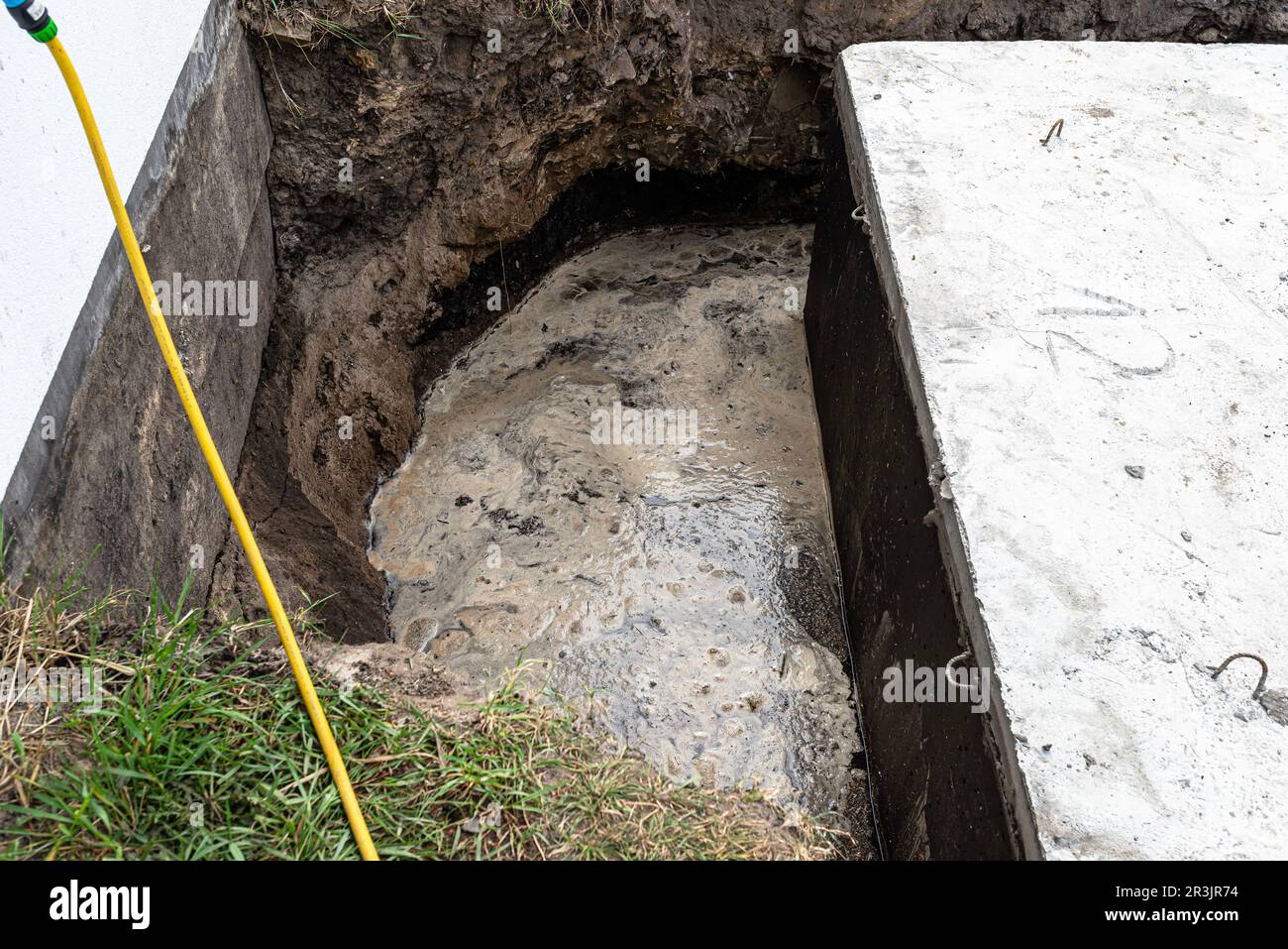 Concrete septic tank with a capacity of 10 cubic meters placed in the ...