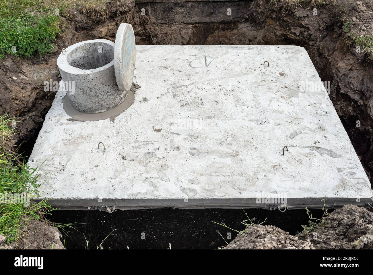 Concrete septic tank with a capacity of 10 cubic meters placed in the ...