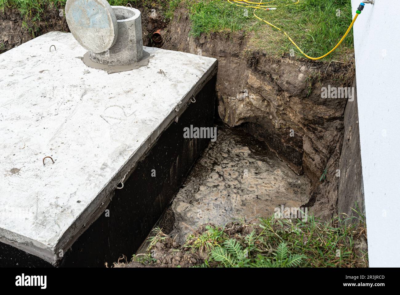 Concrete septic tank with a capacity of 10 cubic meters placed in the ...