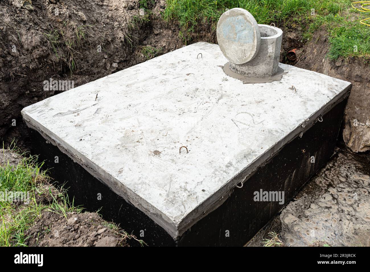 Concrete septic tank with a capacity of 10 cubic meters placed in the ...