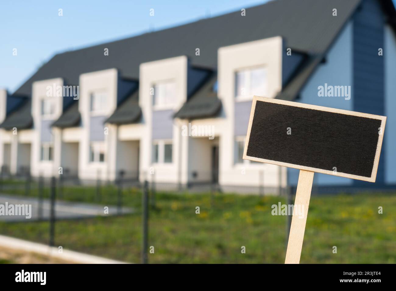 Blank Black billboard against apartment family house Empty mockup ...