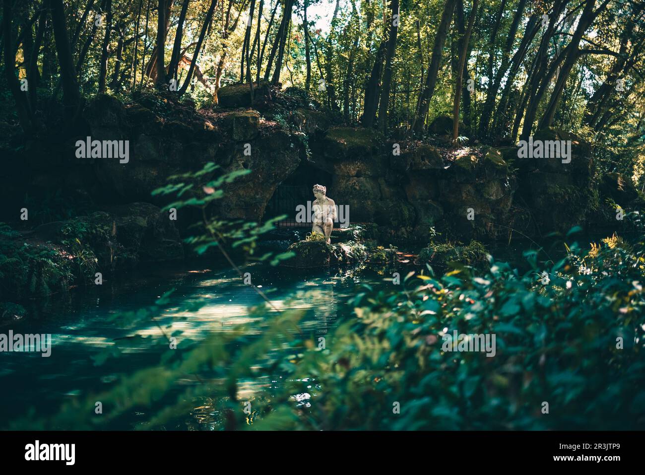 Marble statue in the secret garden Stock Photo - Alamy