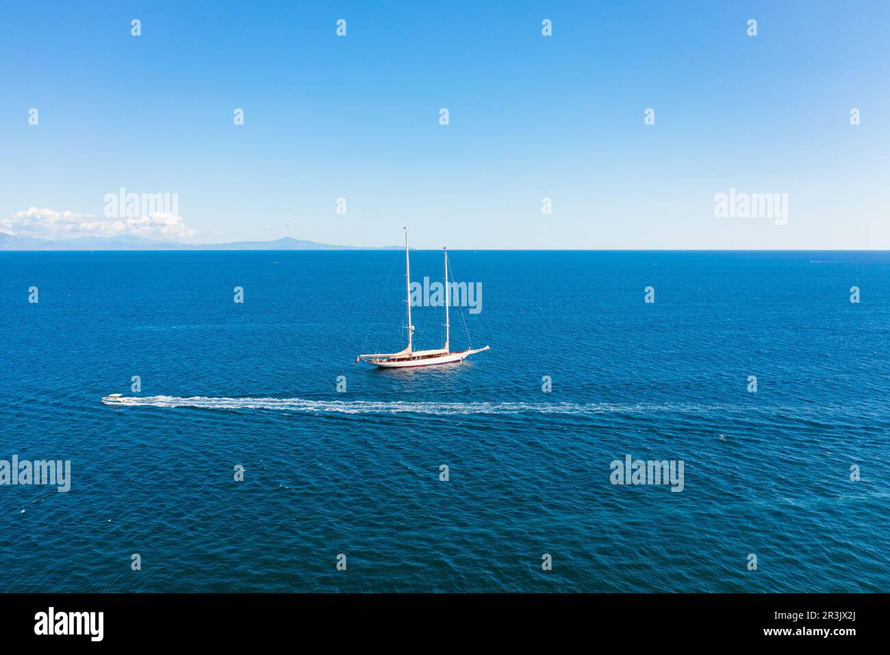 Sailing ship anchored at sea Stock Photo - Alamy