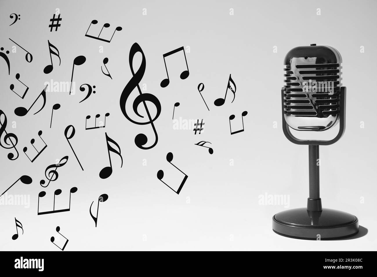 Music notes and other musical symbols flowing from retro microphone on ...