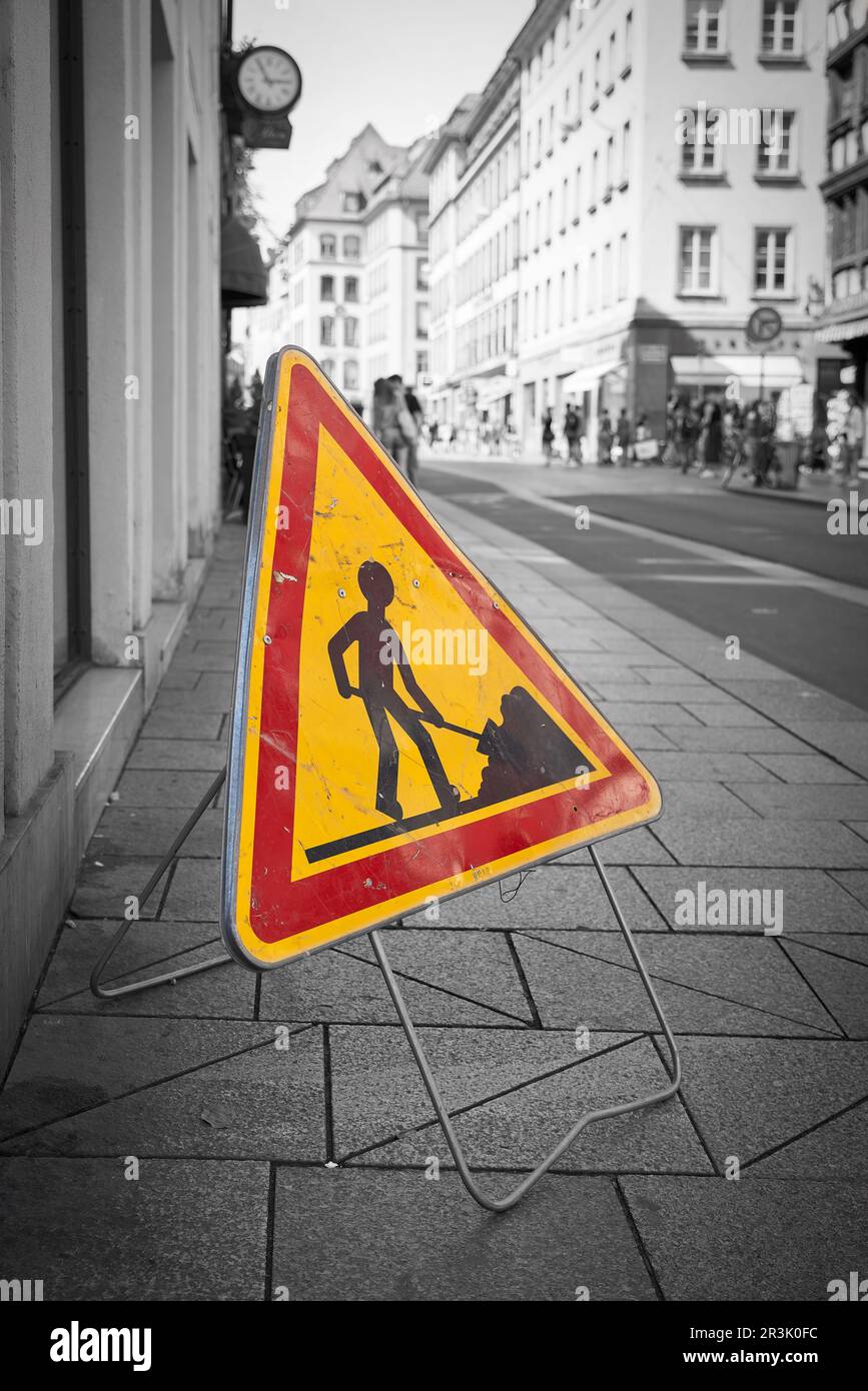 Construction site sign on a footpath in the old town of Strasbourg in ...