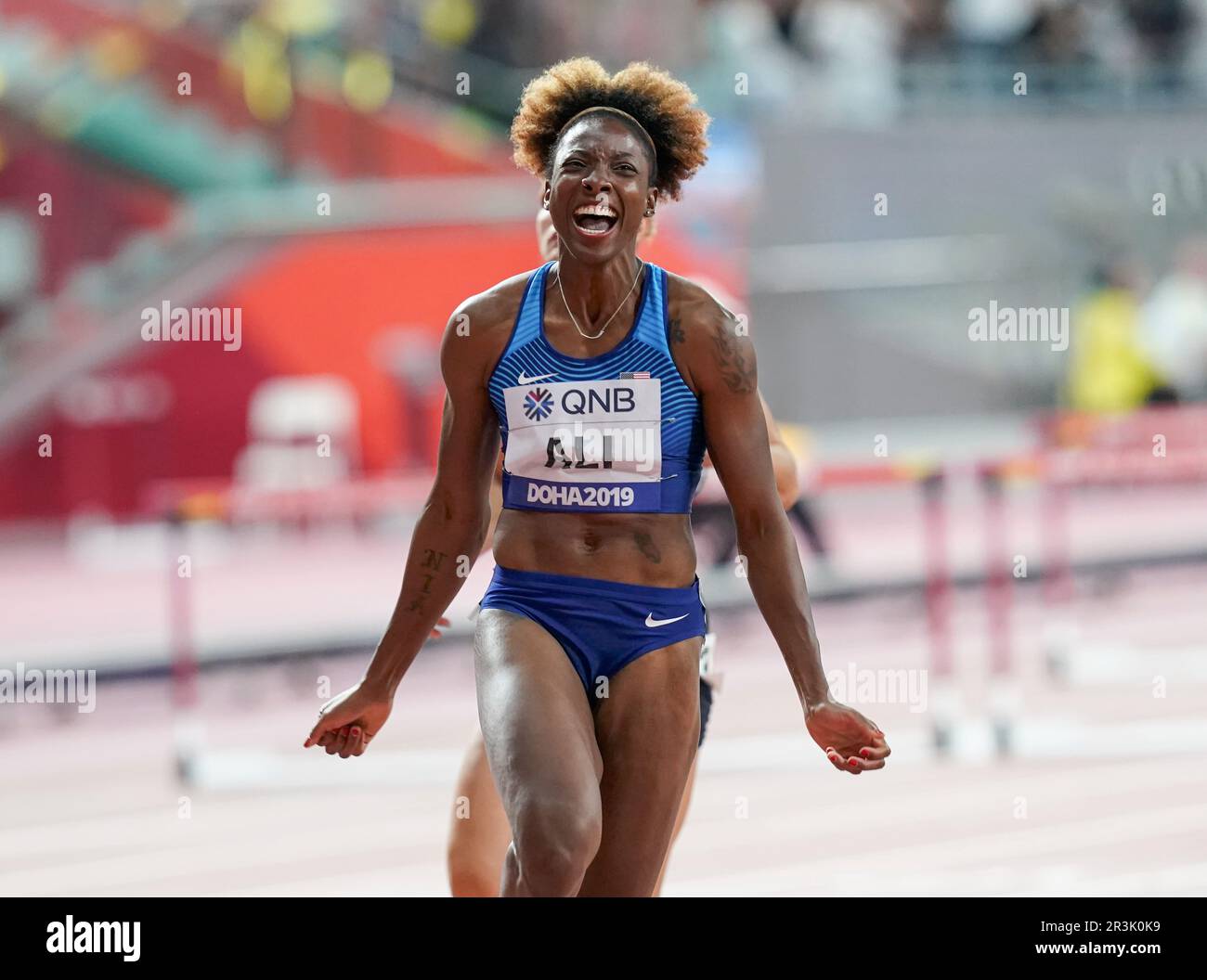Nia Ali winning the 100m hurdles at the 2019 World Athletics ...