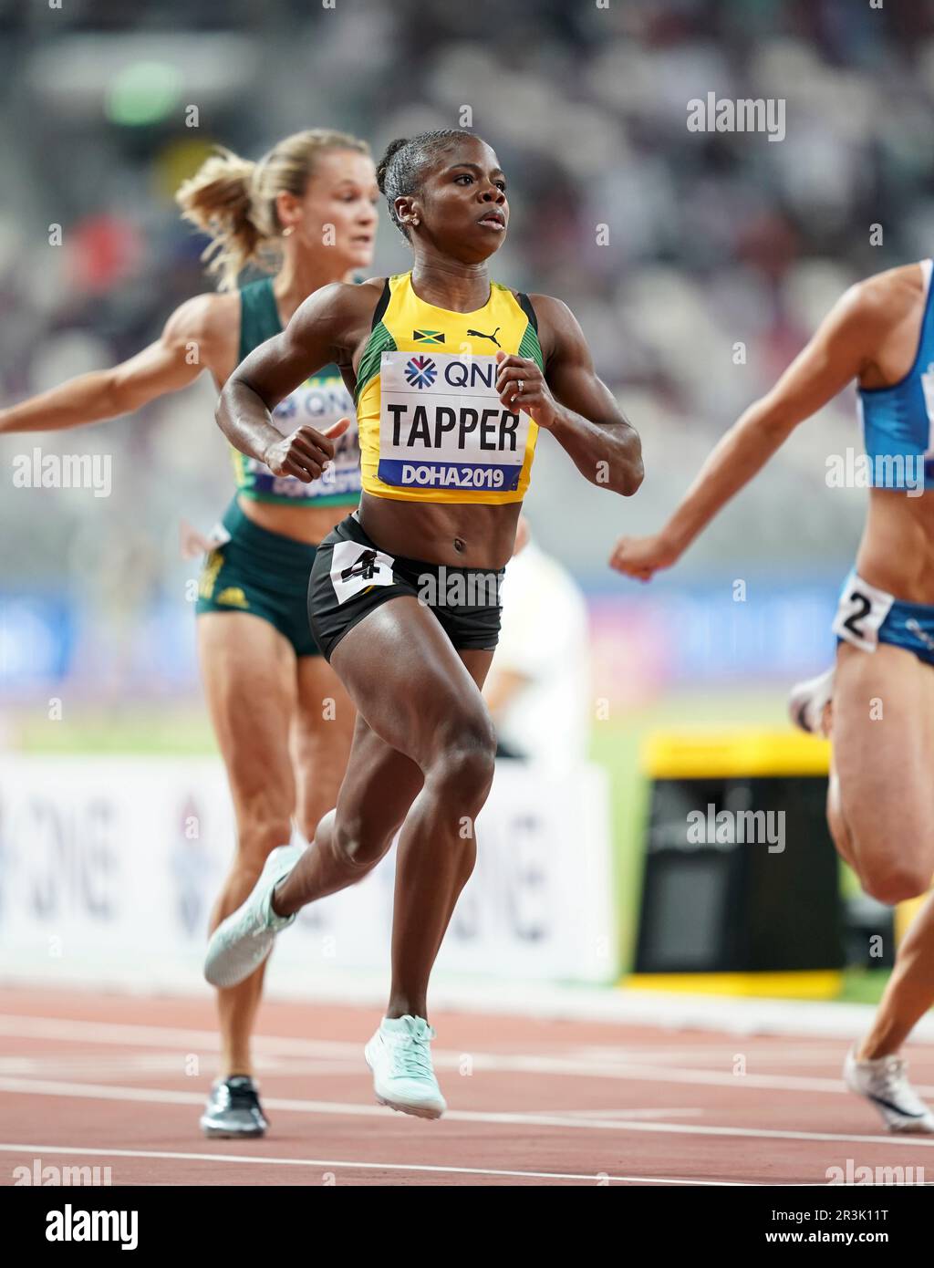 Megan Tapper running the 100m hurdles at the 2019 World Athletics ...