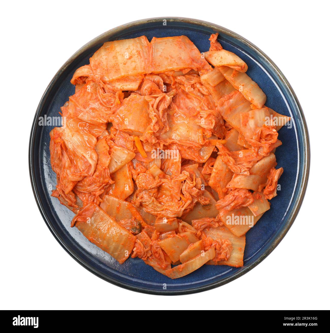 Plate of delicious kimchi with Chinese cabbage isolated on white, top ...