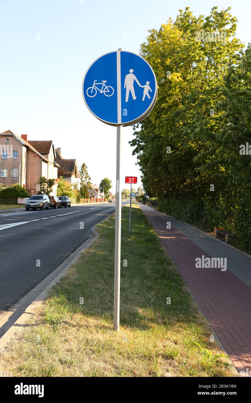 Traffic sign compulsory track for pedestrians and bicycles on city ...