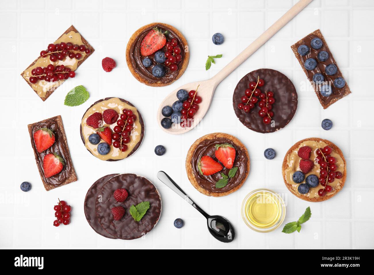 Fresh rye crispbreads, crunchy rice cakes and rusks with different ...