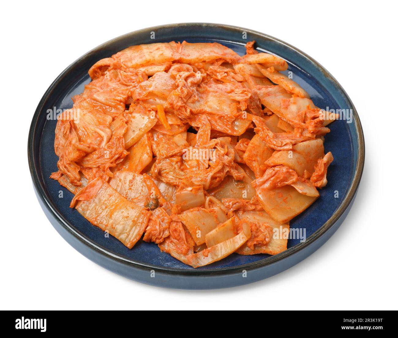 Plate of delicious kimchi with Chinese cabbage isolated on white Stock ...