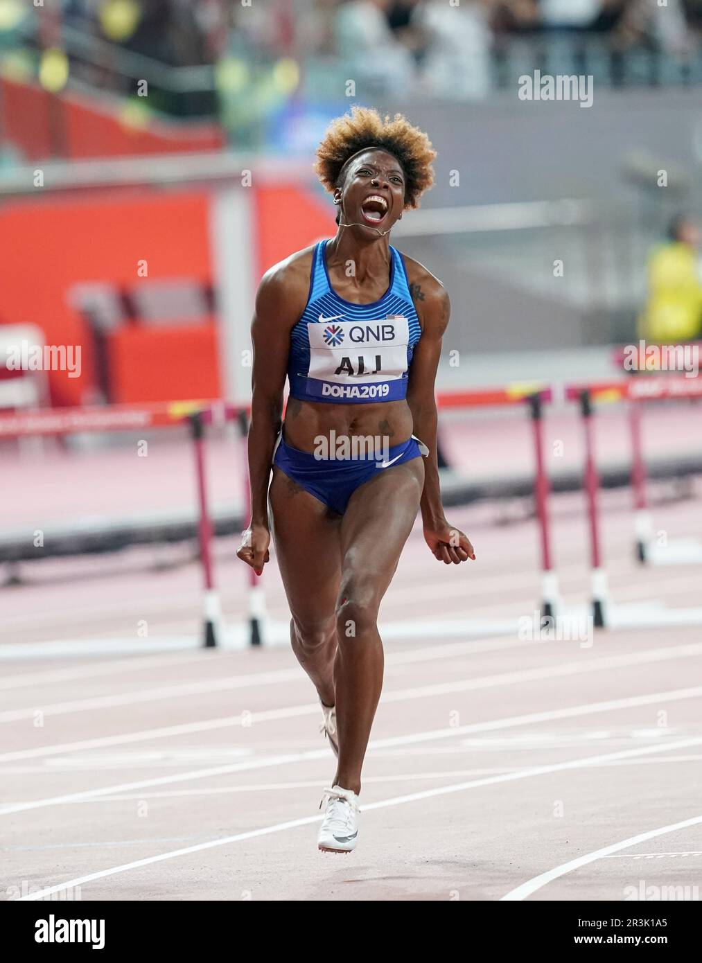 Nia Ali winning the 100m hurdles at the 2019 World Athletics ...