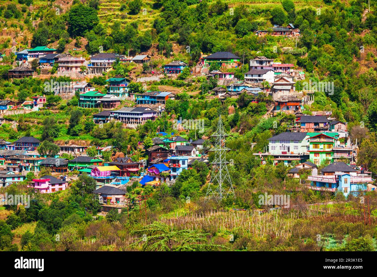 Scenic landscape of the local houses and forested Himalaya mountains in ...