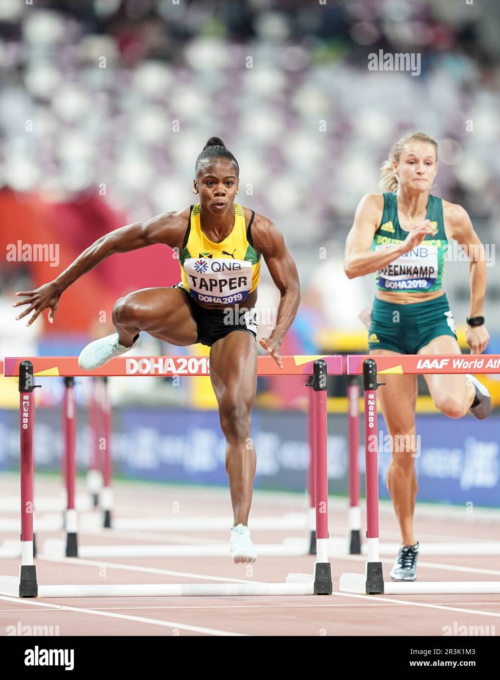 Megan Tapper running the 100m hurdles at the 2019 World Athletics ...
