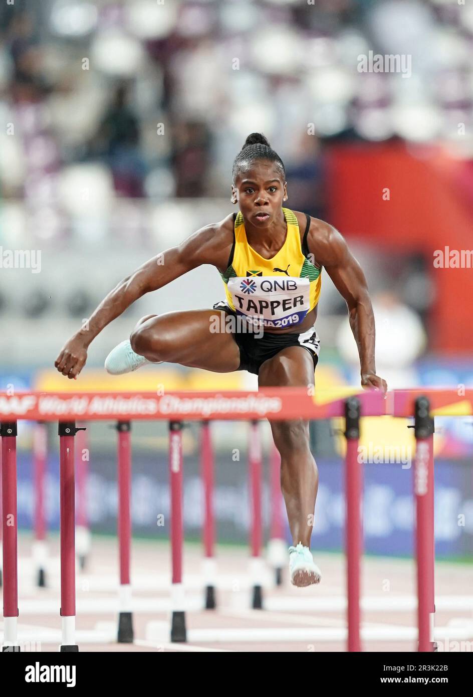Megan Tapper running the 100m hurdles at the 2019 World Athletics ...