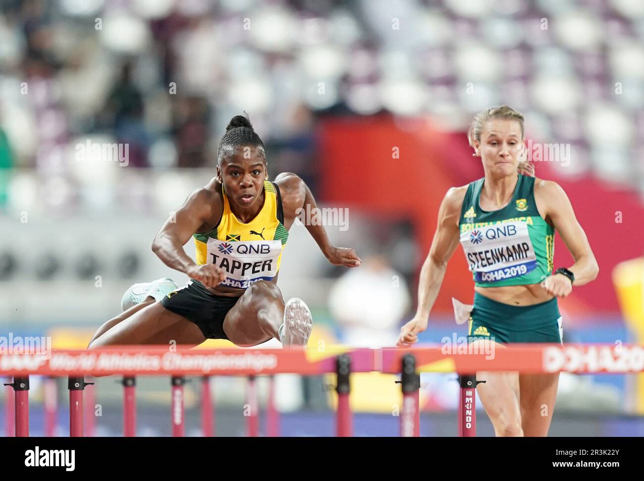 Megan Tapper running the 100m hurdles at the 2019 World Athletics ...
