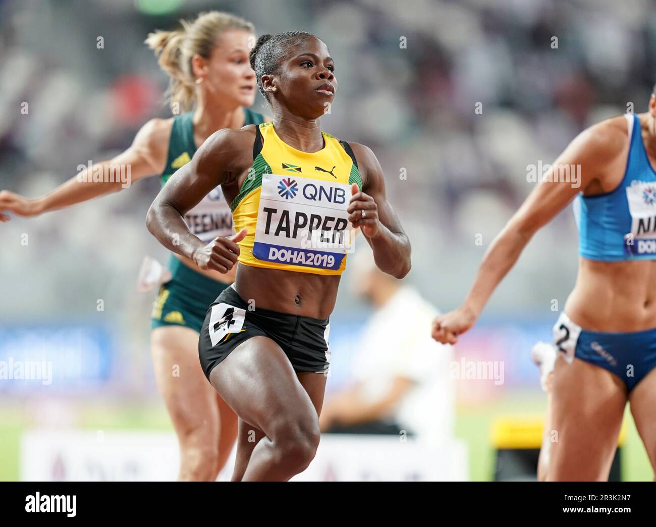 Megan Tapper running the 100m hurdles at the 2019 World Athletics ...