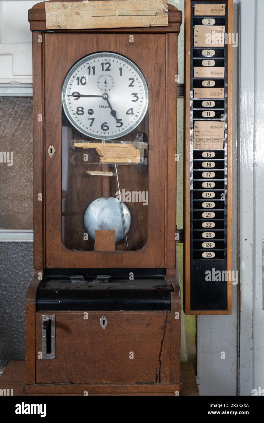 Time clock for time recording in a former thermometer factory Stock ...
