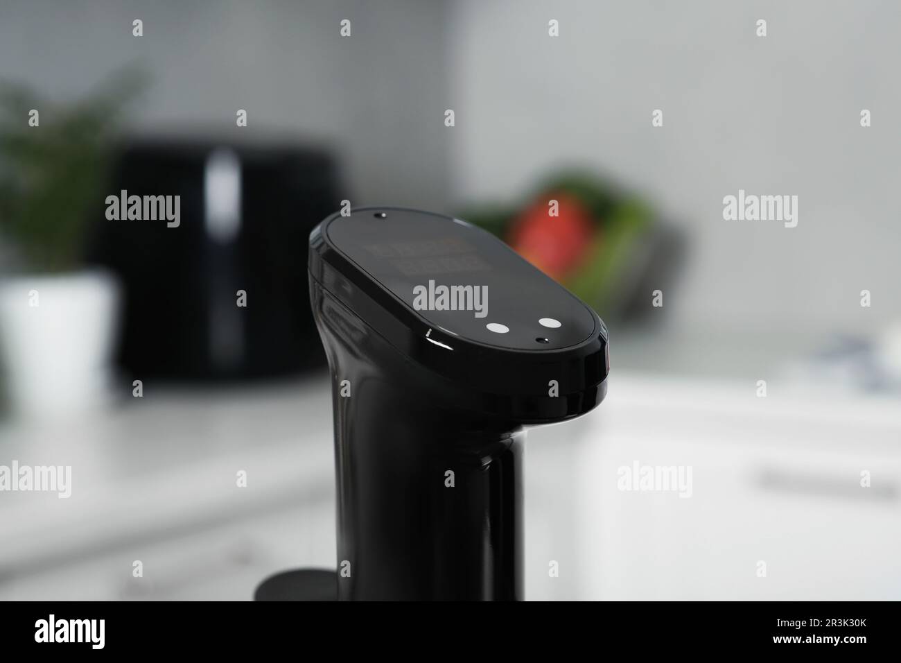 Thermal immersion circulator in kitchen, closeup. Sous vide cooking ...