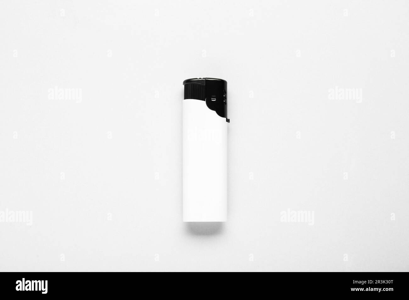 Stylish small pocket lighter on white background, top view Stock Photo ...