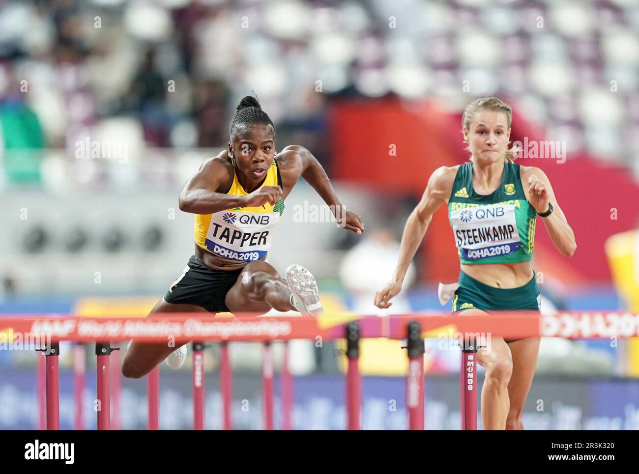 Megan Tapper running the 100m hurdles at the 2019 World Athletics ...