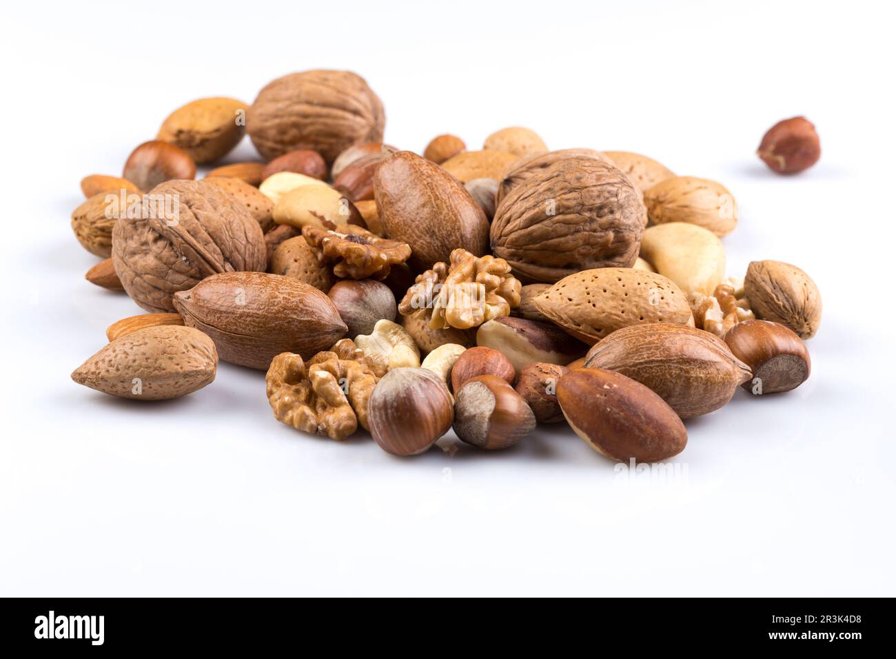 Variety of Mixed Nuts Isolated on White Background Stock Photo - Alamy