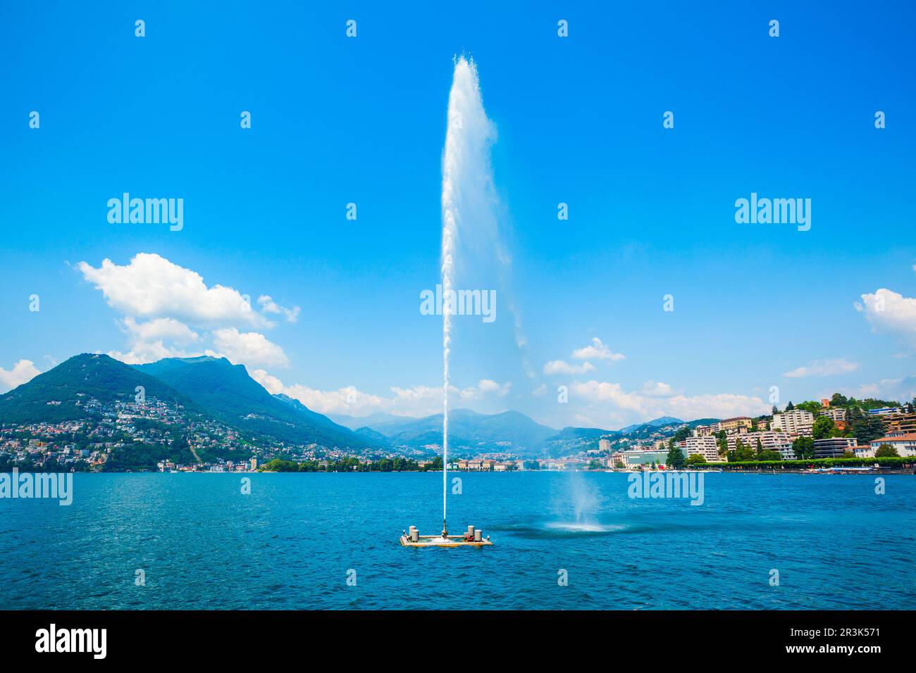 Fountain at Lugano lake and Lugano city panoramic view in canton of ...