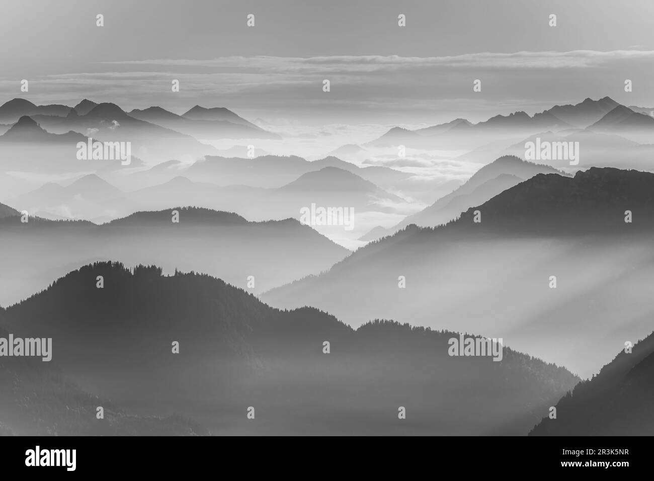 Mountain layers in the ammergau alps in the morning in black and white ...